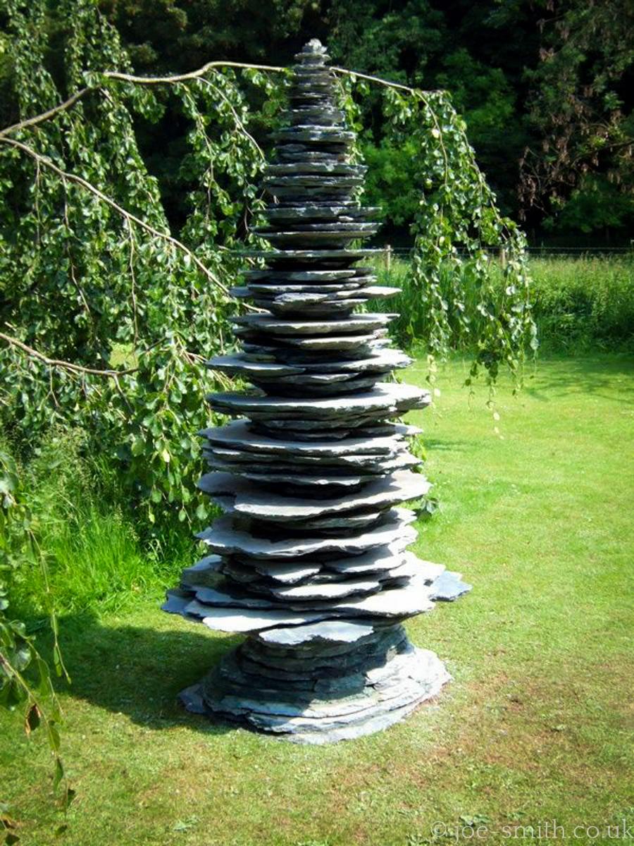 Vases and decorative sculpture for the garden, in slate and stone, by ...