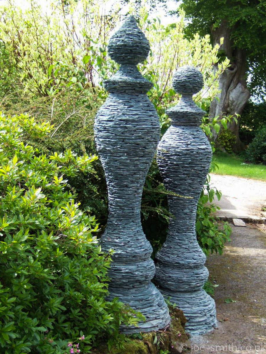 Vases and decorative sculpture for the garden, in slate and stone, by ...