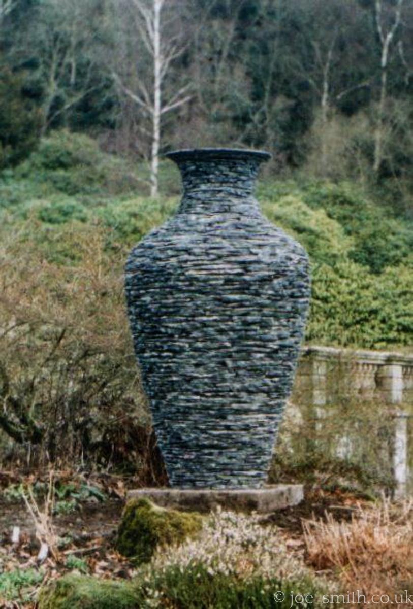 Vases and decorative sculpture for the garden, in slate and stone, by ...