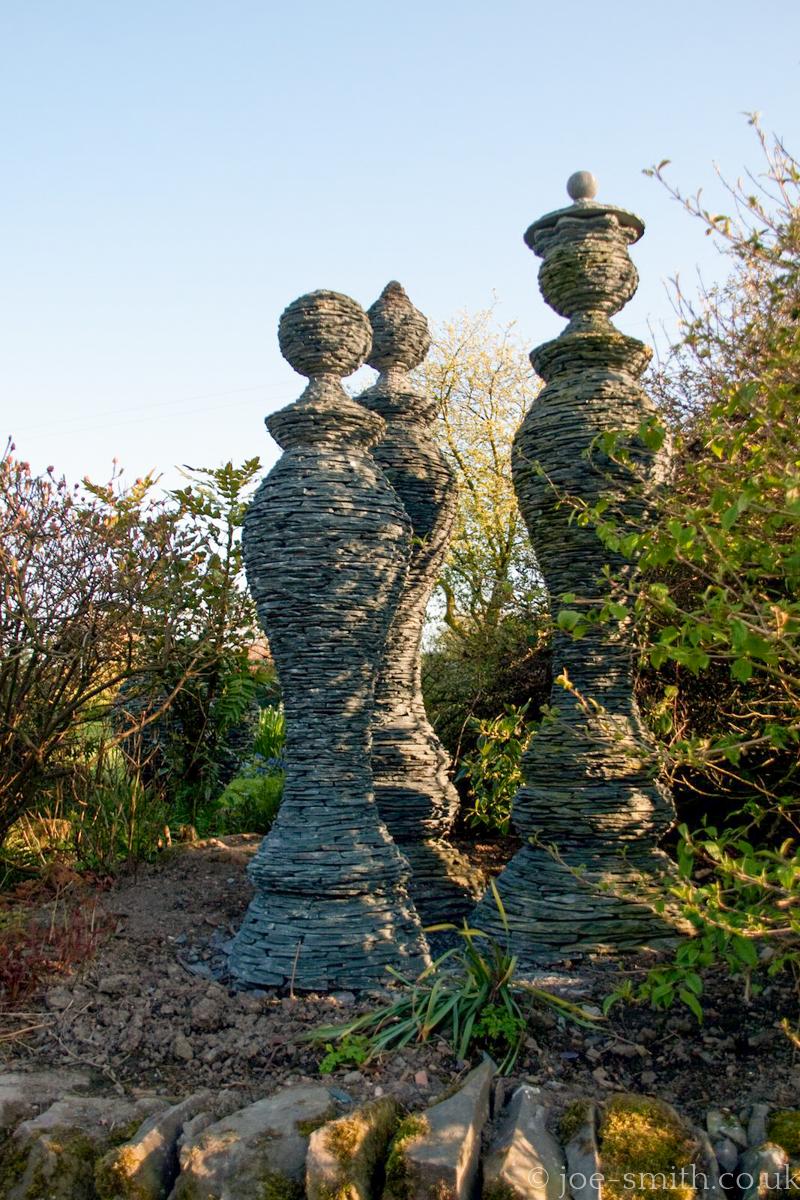 Vases and decorative sculpture for the garden, in slate and stone, by ...