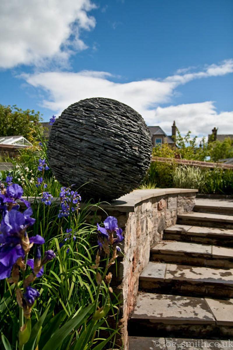 Vases and decorative sculpture for the garden, in slate and stone, by ...