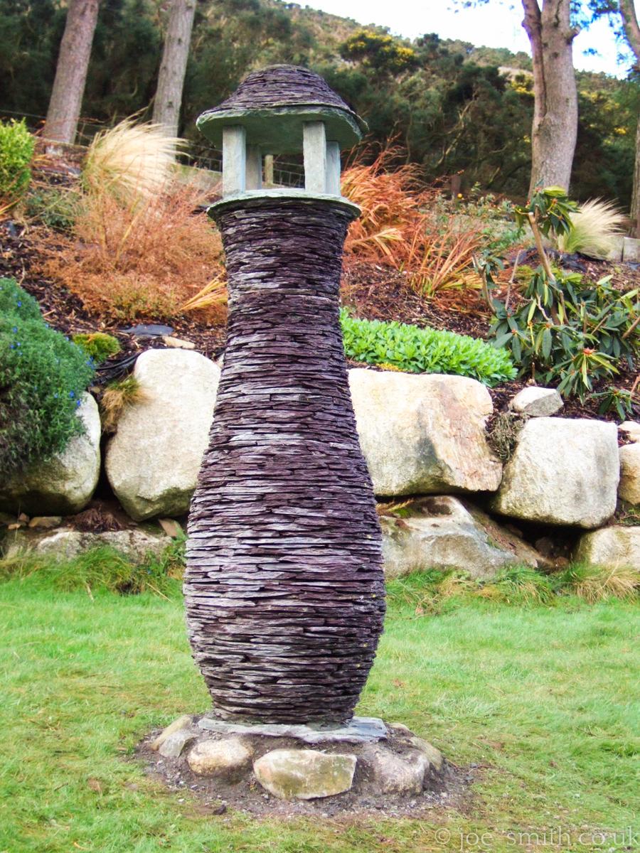 Vases and decorative sculpture for the garden, in slate and stone, by ...