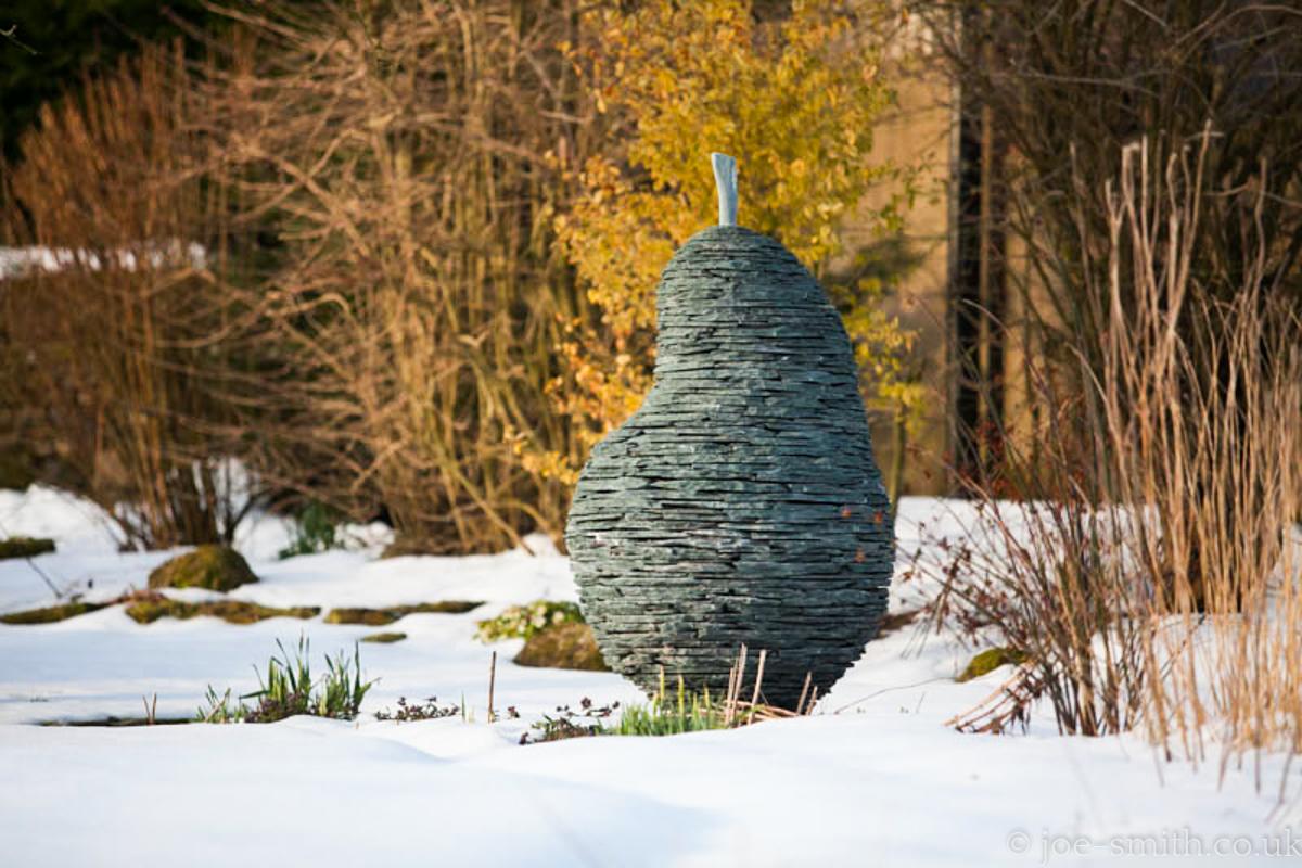 Vases and decorative sculpture for the garden, in slate and stone, by ...