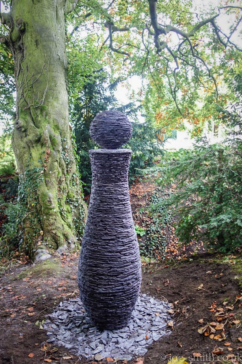 Vases and decorative sculpture for the garden, in slate and stone, by ...